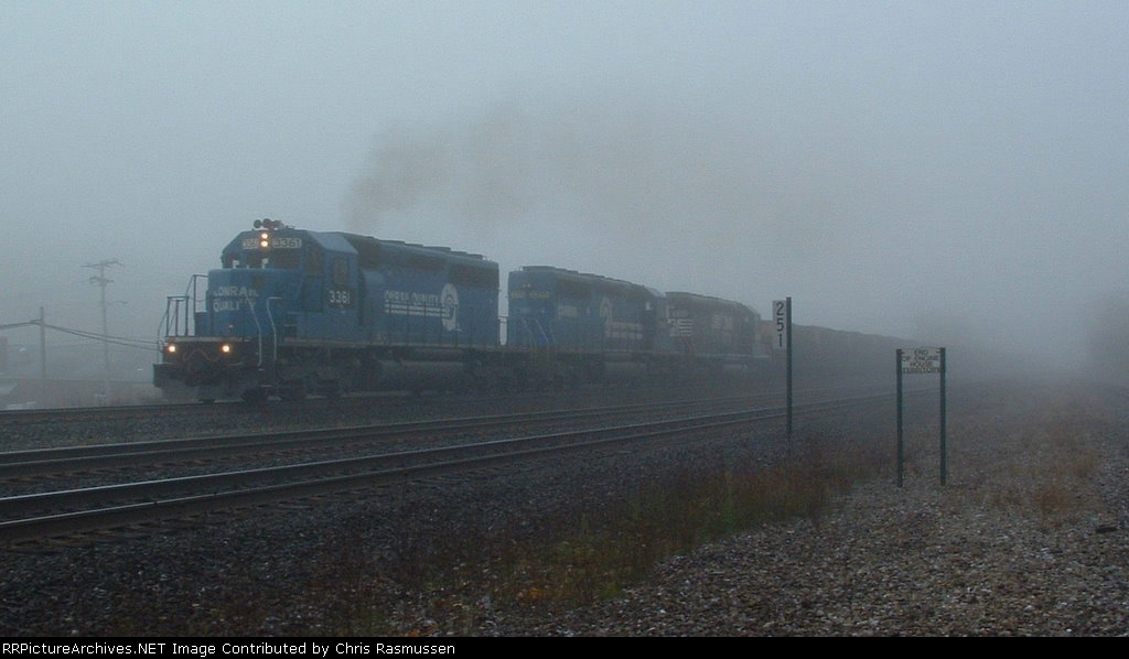NS 3361 leads a loaded coal drag in heavy fog
